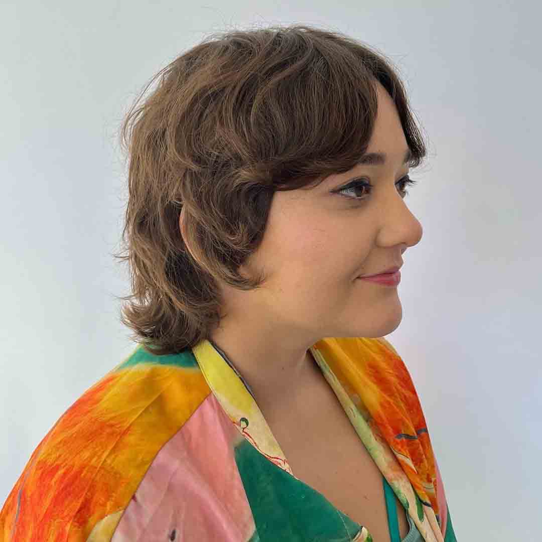 15 Best Shaggy Wolf Cuts With Bangs | HairAide